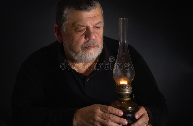 Portrait of Bearded Senior Man Taking an Old Kerosene Lamp Stock Photo ...