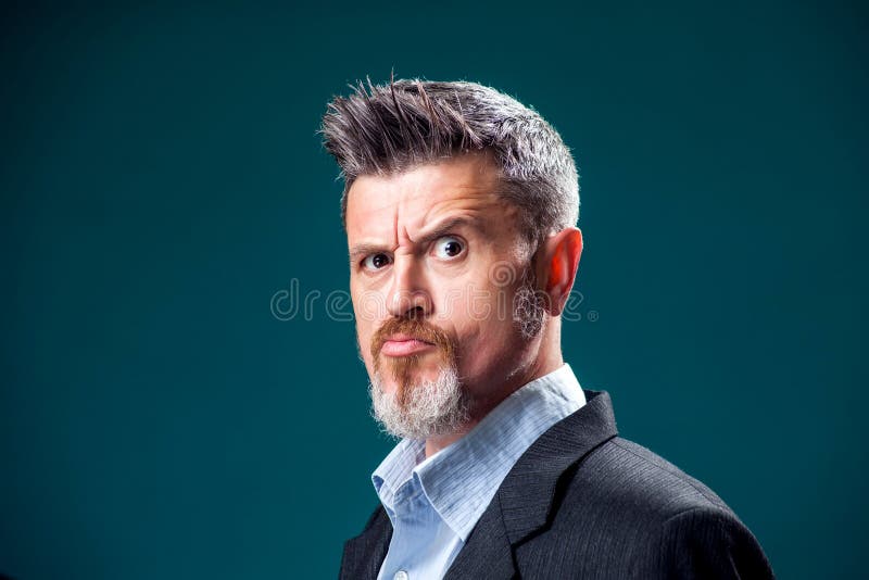 A Portrait of Bearded Serious Man. People and Emotions Concept Stock ...