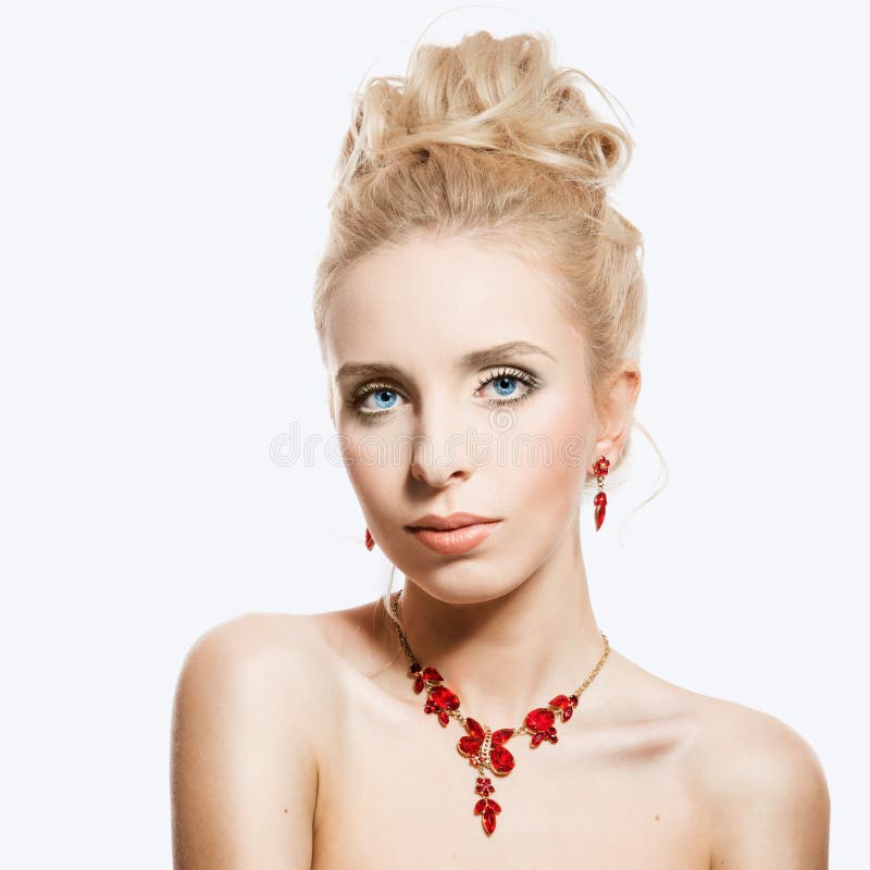 Portrait Of Beautiful Blond Woman With A Ruby Jewelry On Stock Image