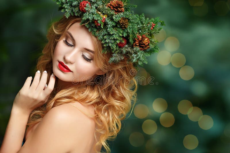 Portrait Of A Beautiful Blonde Girl With Fir Wreath On His Head Stock