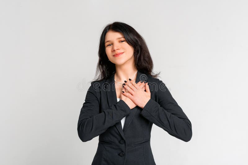 Portrait Of Beautiful Brunette Teen Girl In Black Blazer Standing