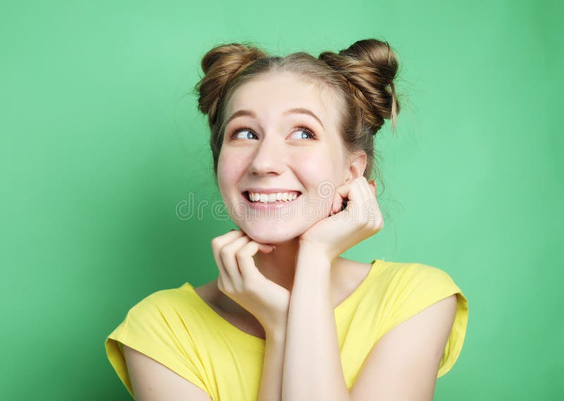 Portrait Of Beautiful Cheerful Girl Smiling Laughing Looking At Camera