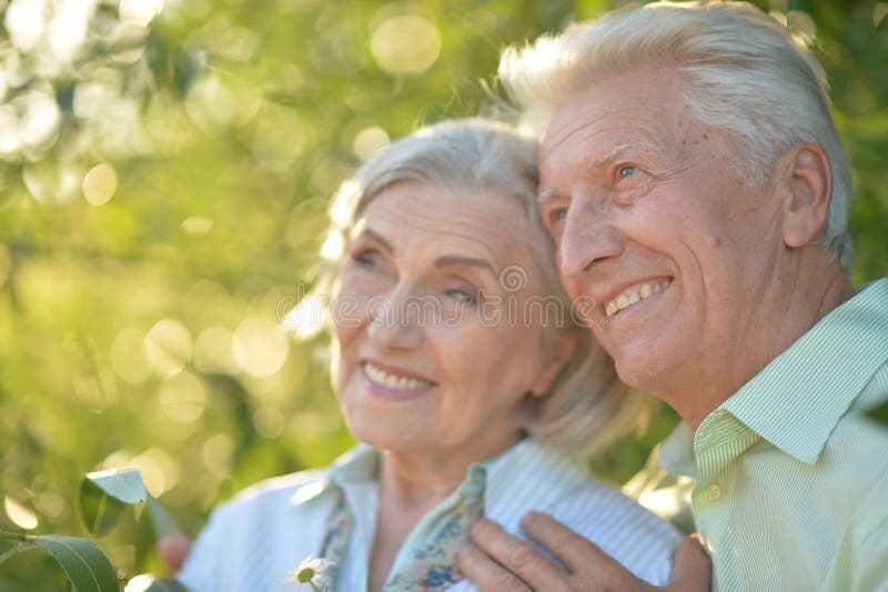 Portrait of Beautiful Elderly Couple Together in Park Stock Photo ...