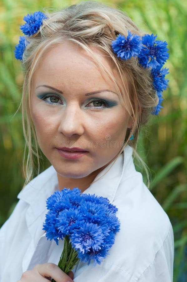 Portrait of Beautiful Female with Blue Flowers Stock Image - Image of ...