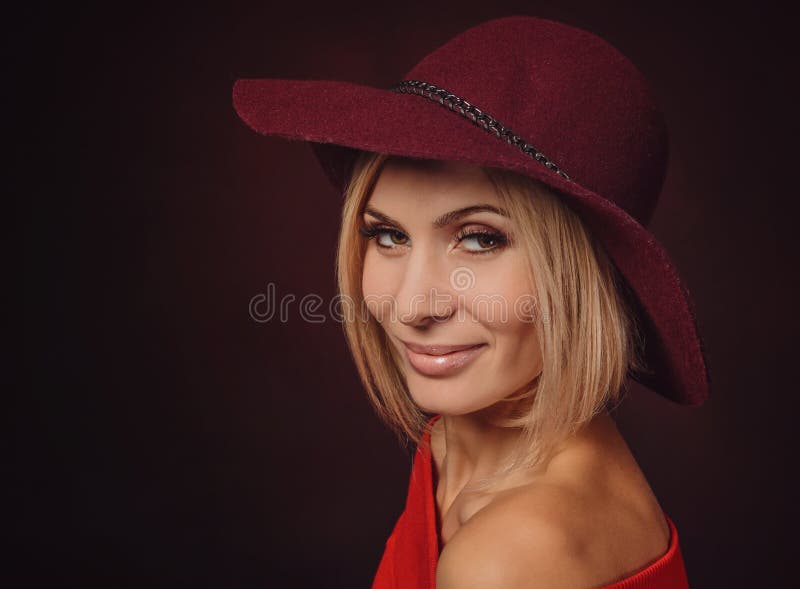 Portrait of Beautiful Female in Red Clothing Looking at the Camera ...