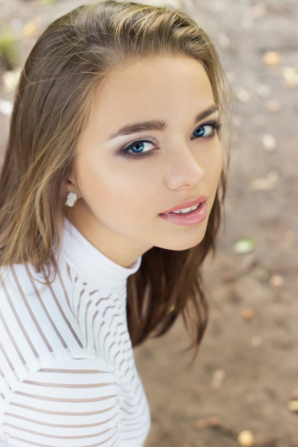 Portrait Of A Beautiful Girl With Blue Eyes Full Lips Beautiful