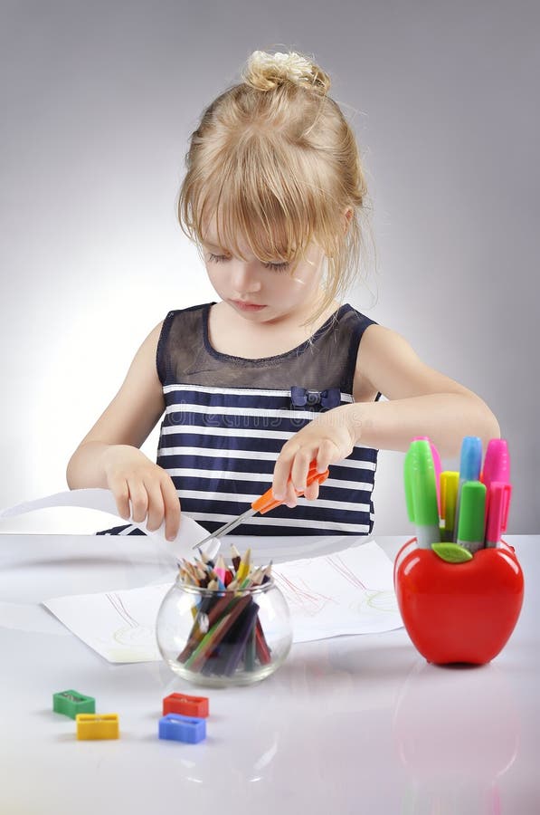 Portrait of Beautiful Girl Cutting Paper with Scissors. Stock Image ...