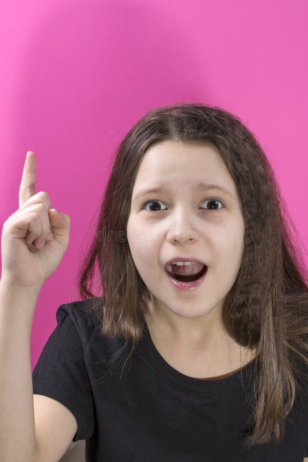 Portrait of a Beautiful Girl with a Raised Finger Stock Image - Image ...