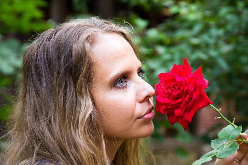 Portrait of a Beautiful Girl with a Red Rose Stock Image - Image of ...