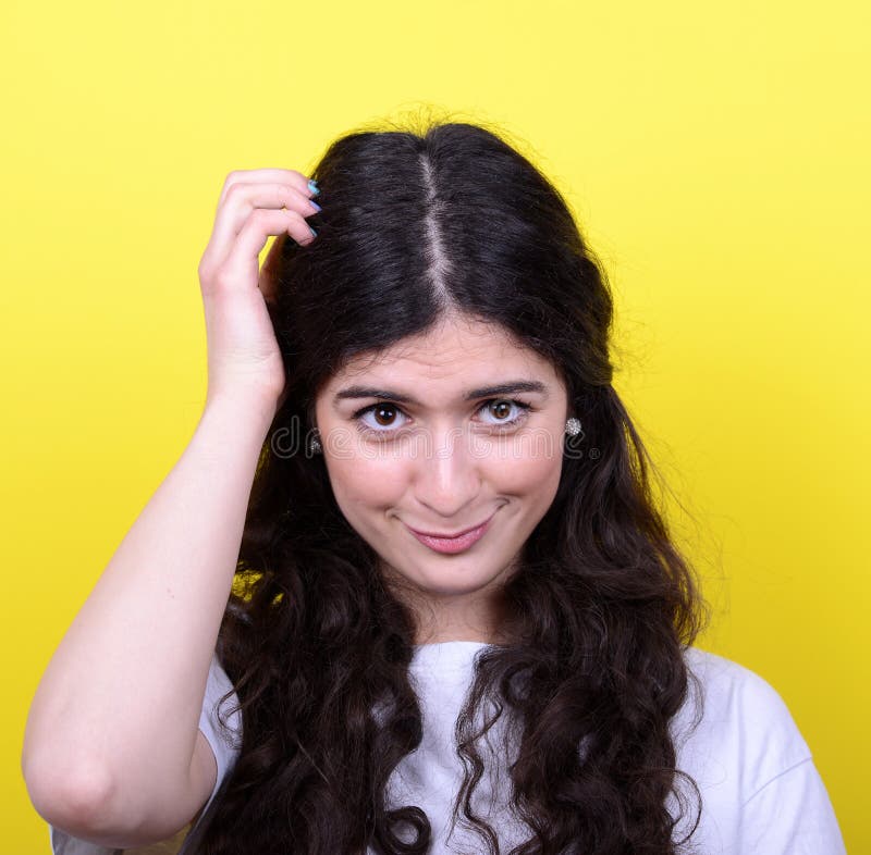 Portrait of Beautiful Girl Thinking and Scratching Head Against Stock ...