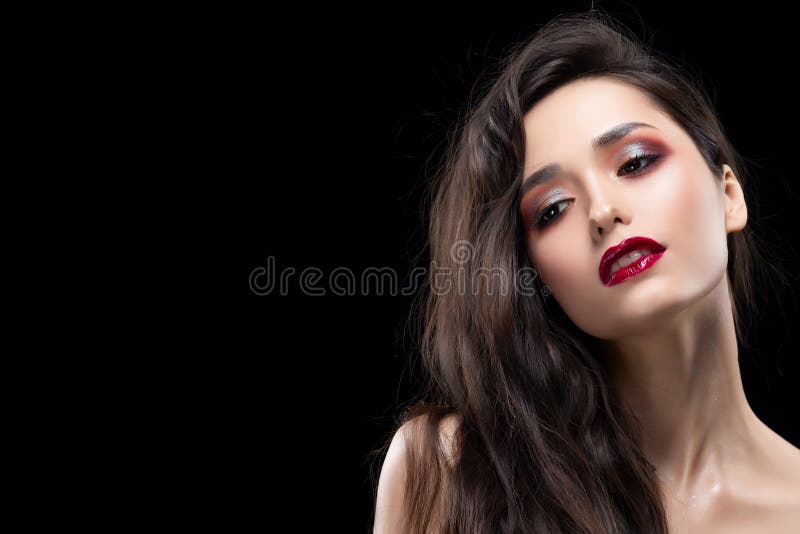 Portrait Of A Beautiful Glamorous Brunette Girl With Naked Shoulders