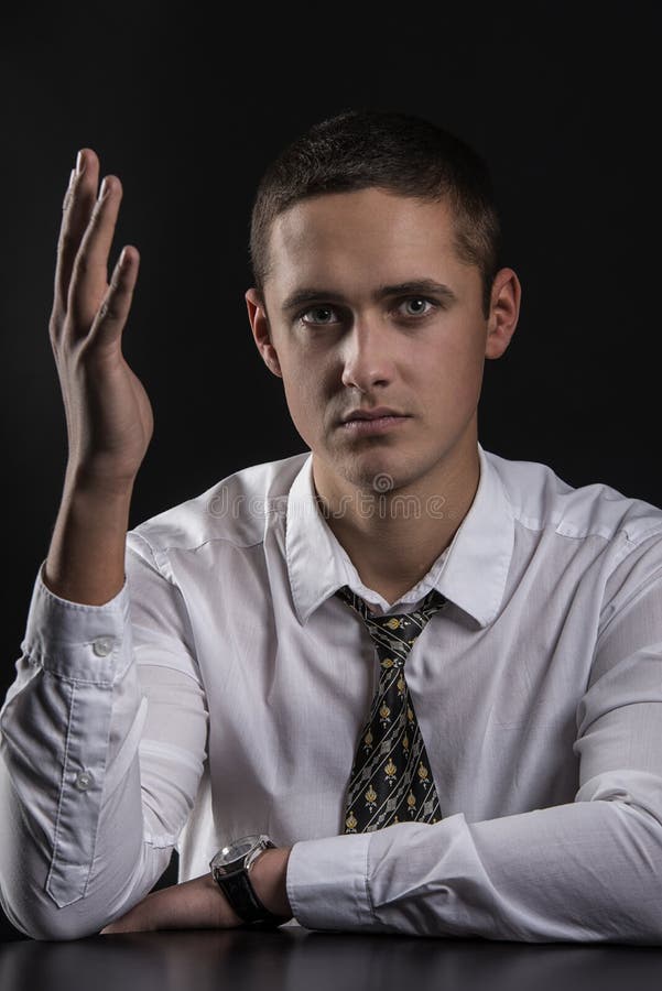 Serious Young Man Asking Question Stock Photo - Image of eyebrows ...