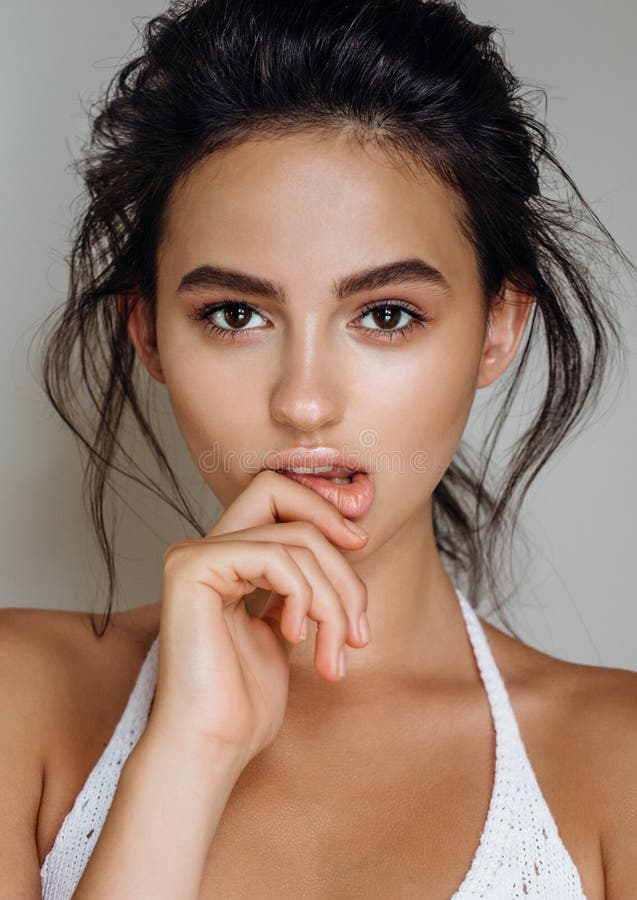 Portrait of Beautiful Model on a Grey Background in the Studio Stock ...