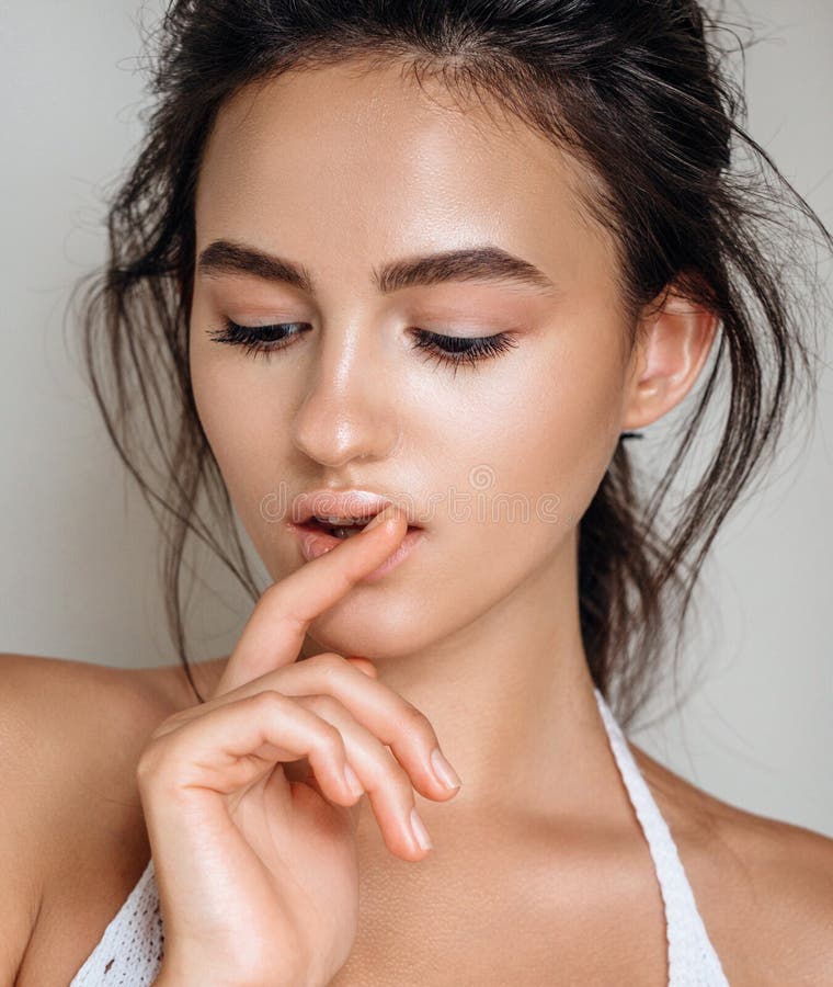 Portrait of Beautiful Model on a Grey Background in the Studio Stock ...