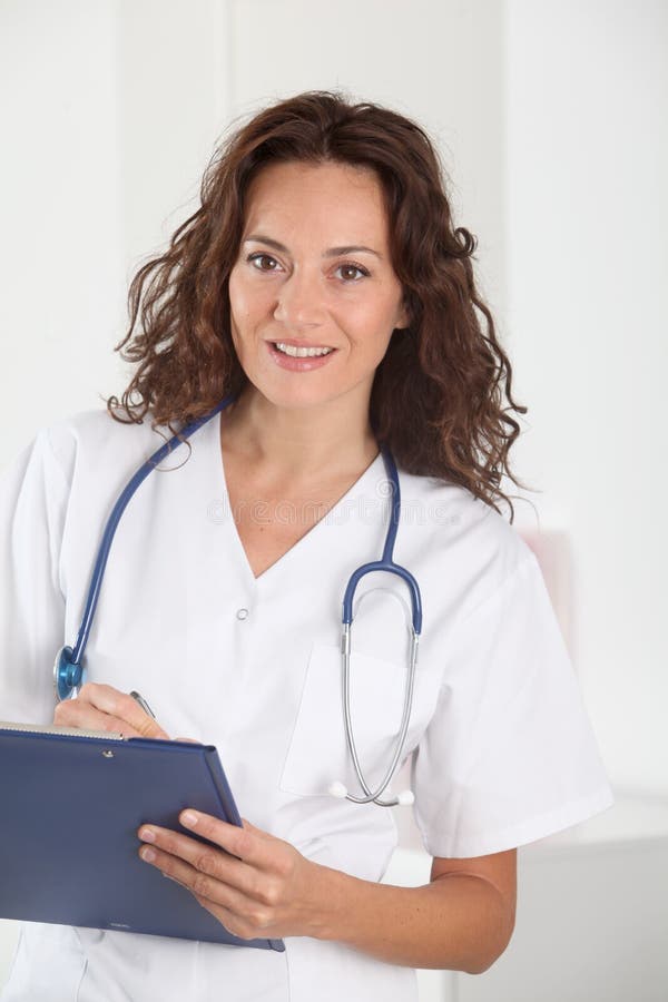 Portrait of Beautiful Nurse Stock Image - Image of indoors, hospital ...