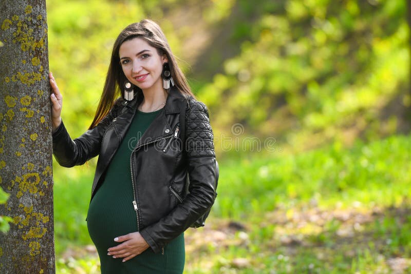 Portrait Of A Beautiful Pregnant Brunette Young Beautiful Pregnant