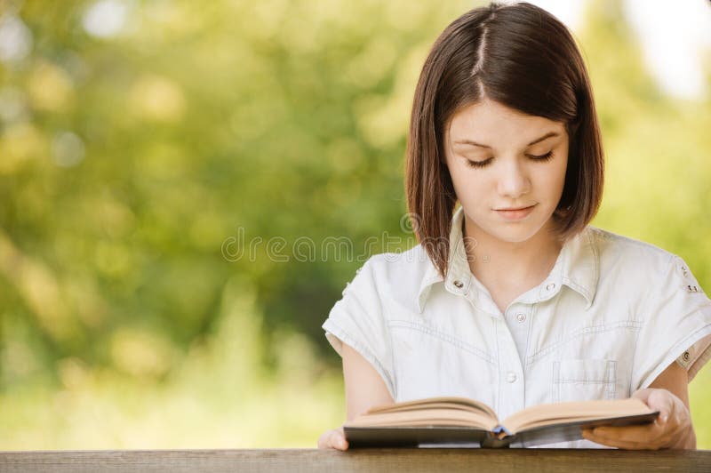 Reading with a smile stock photo. Image of child, college - 1116822