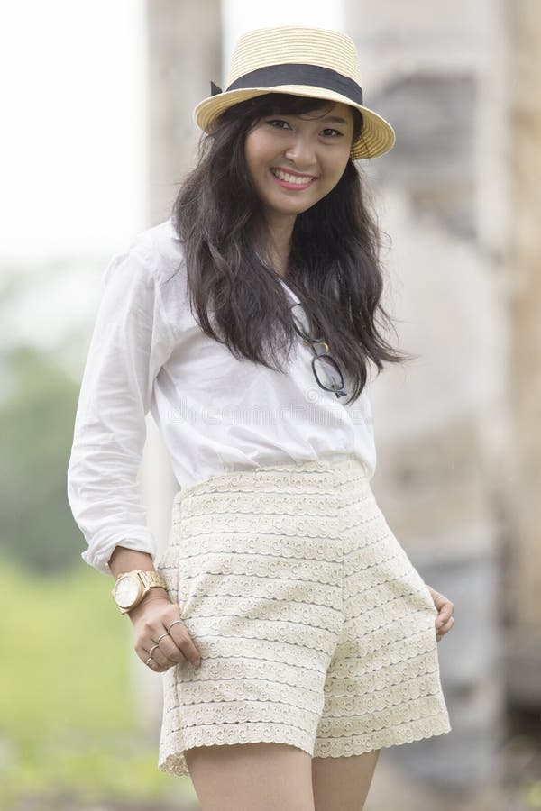 Portrait Of Beautiful Street Fashion Shot Of Asian Younger Woma Stock