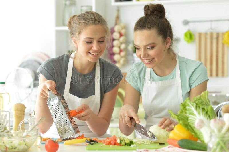 Portrait of Beautiful Teenagers Cooking in Kitchen Stock Photo - Image ...