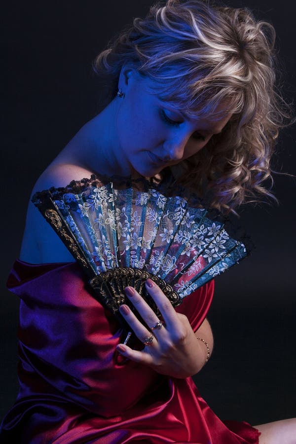 Portrait of Beautiful Woman with Fan in Studio Stock Photo - Image of ...
