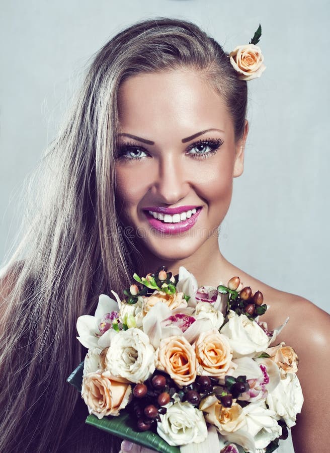 Portrait of a Beautiful Woman with Flowers. Stock Photo - Image of ...