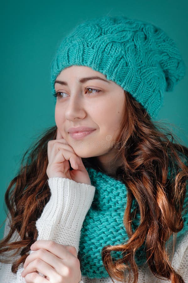 Portrait of a Beautiful Woman in a Knitted Hat in the Studio Stock ...