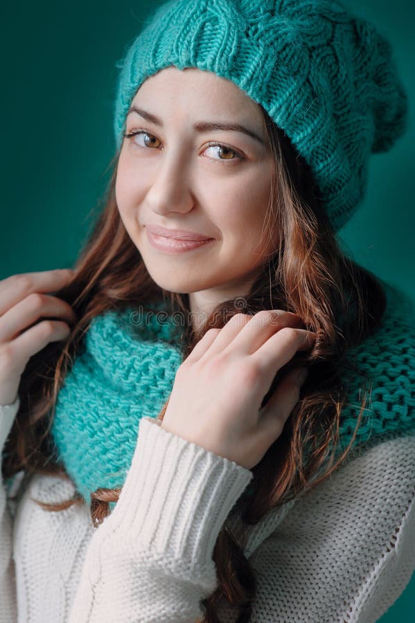 Portrait of a Beautiful Woman in a Knitted Hat in the Studio Stock ...