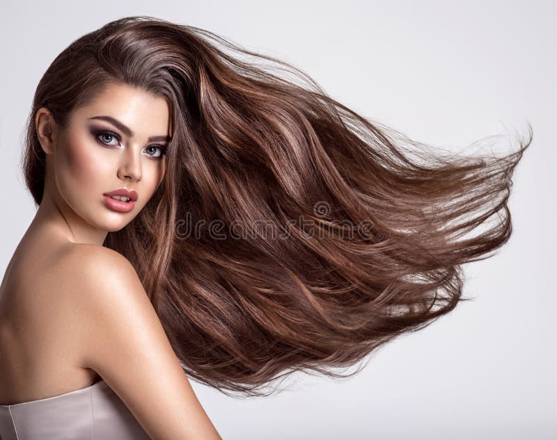 Face Of A Beautiful Woman With Long Brown Curly Hair Fashion Model
