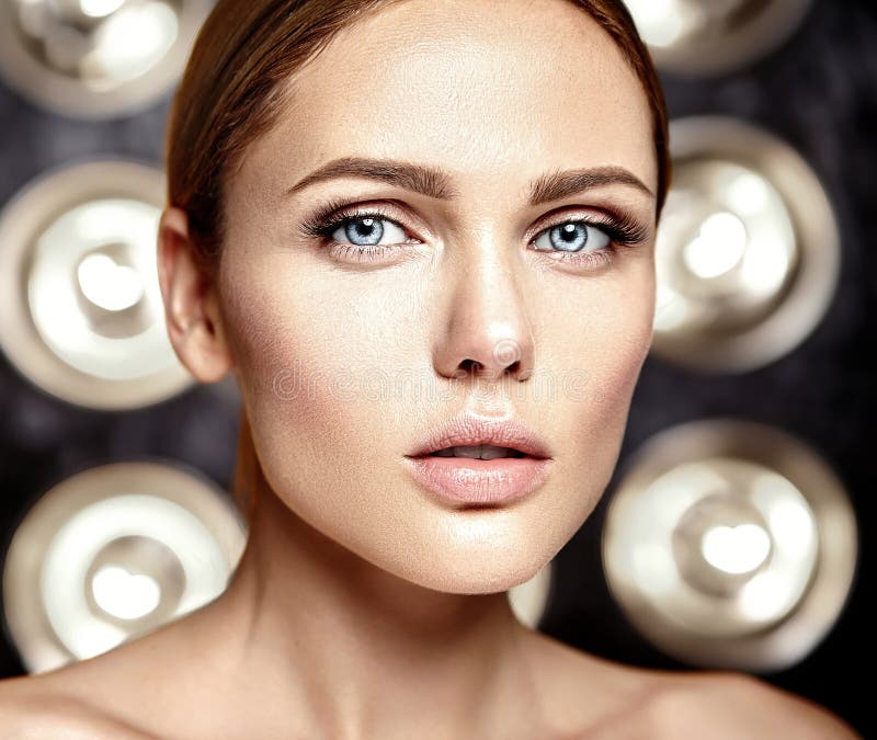 Portrait Of Beautiful Woman Model With Makeup And Clean Healthy Skin