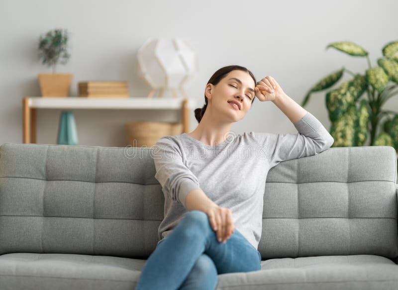 Woman Resting on Sofa at Home Stock Image - Image of attractive, health ...