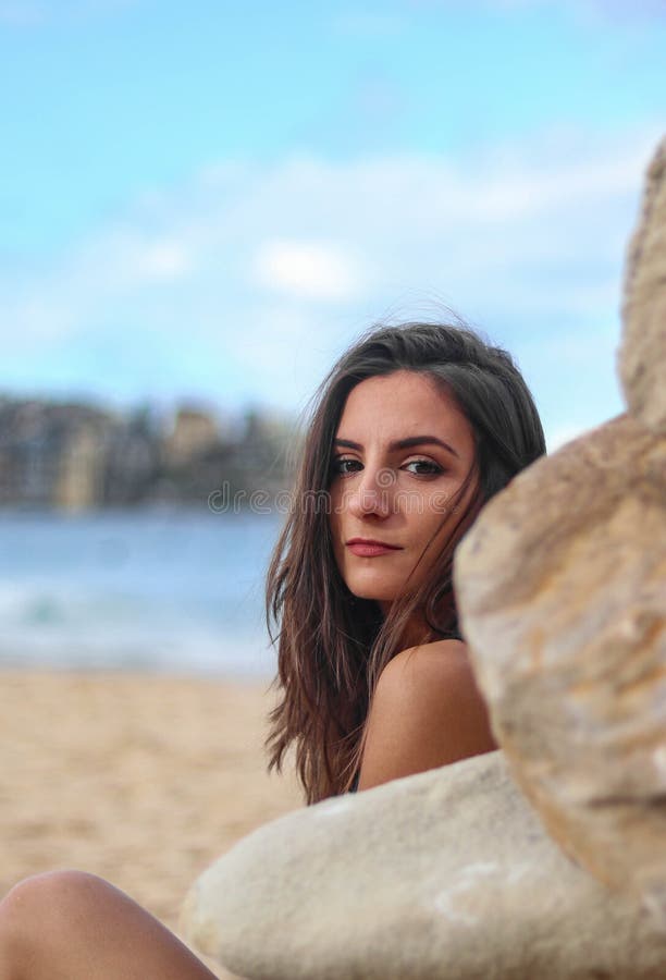 Portrait Of Beautiful Brunette Woman With Intense Look At The Camera On