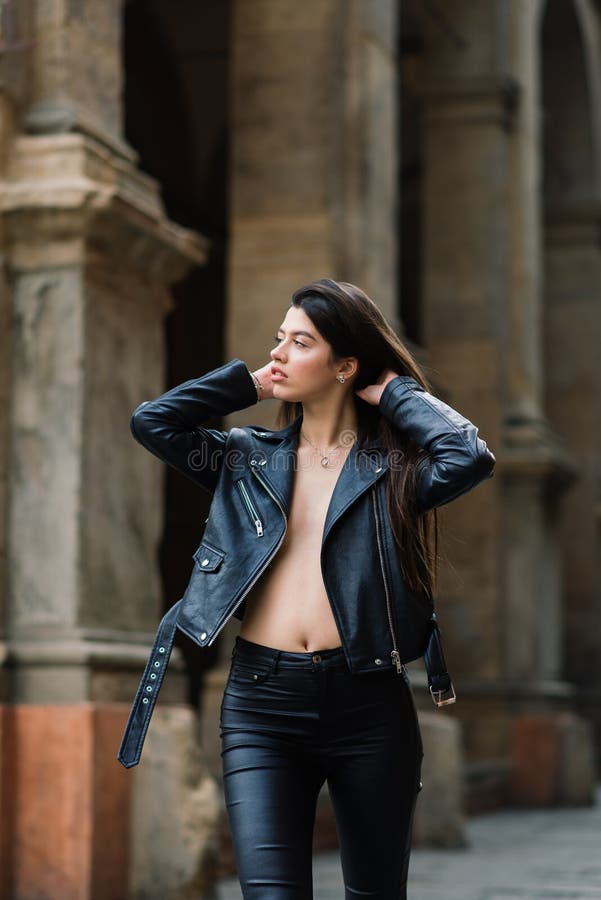 Portrait Of Beautiful Young Brunette Woman In Stylish Black Leather
