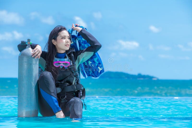 Beautiful Model Happiness Posing To Play At Beach With Swimming Suit On