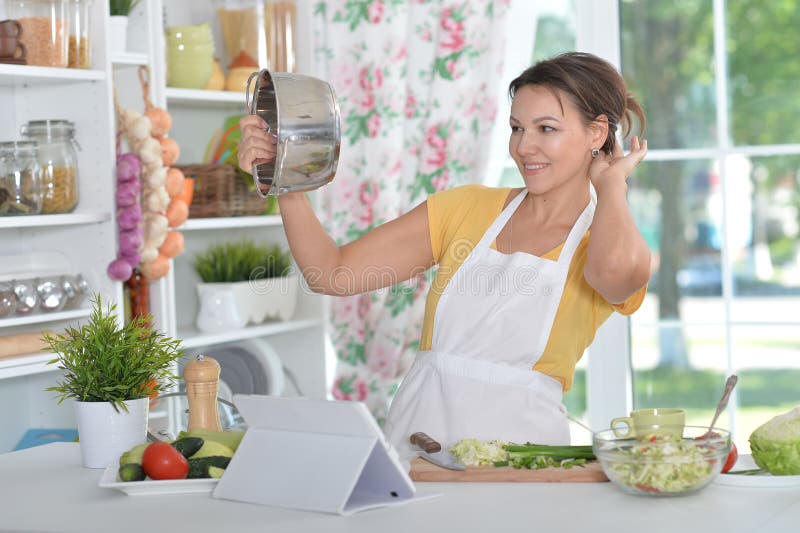 Portrait of Beautiful Young Woman Cooking Dinner Stock Photo - Image of ...