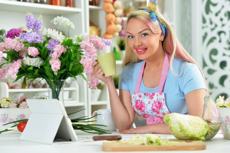 Portrait of Beautiful Young Woman Cooking in Kitchen Stock Image ...