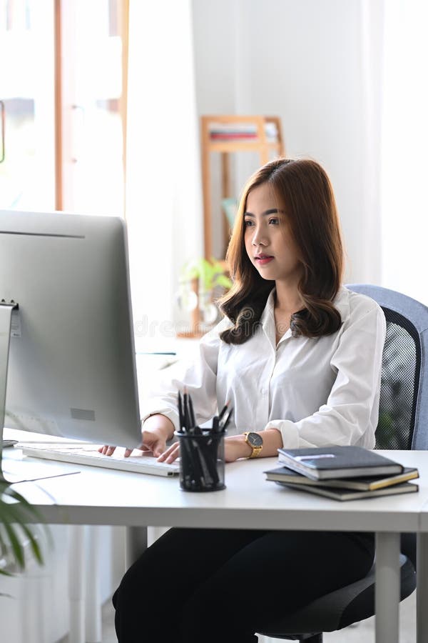 Beautiful Young Woman Office Worker Working with Computer. Stock Photo ...