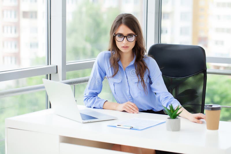 Portrait of Beautiful Young Woman Working in the Office. Stock Photo ...