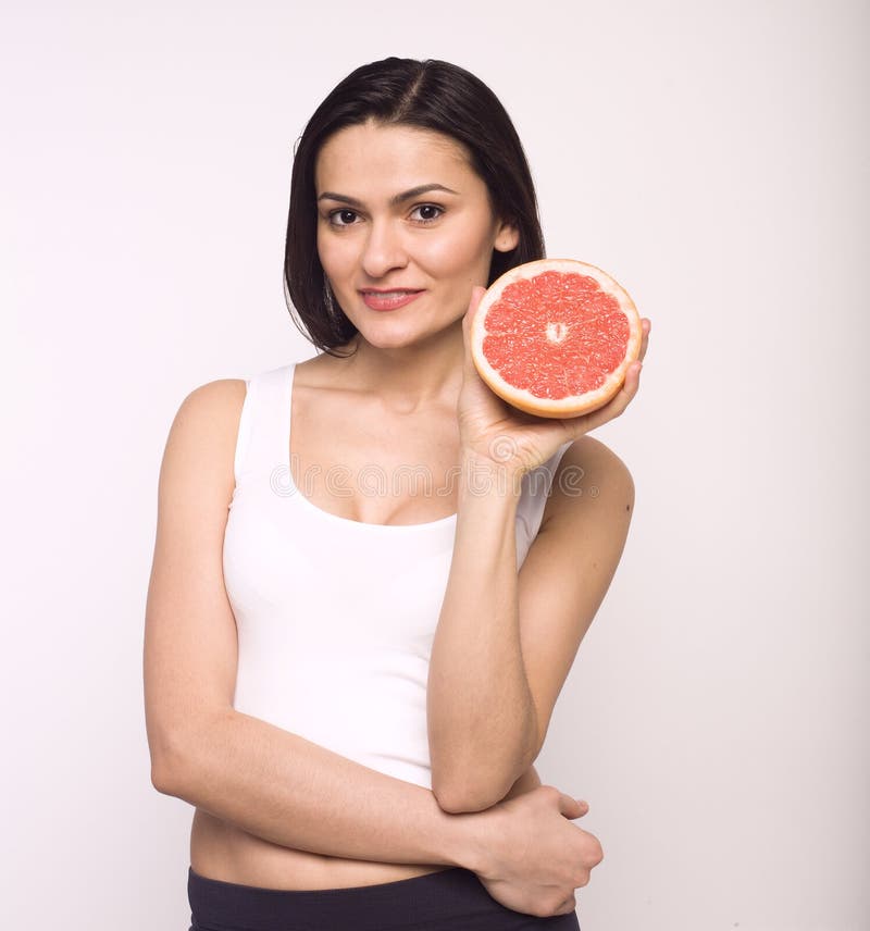 Portrait of Beauty Young Woman with Grapefruit Stock Photo - Image of ...