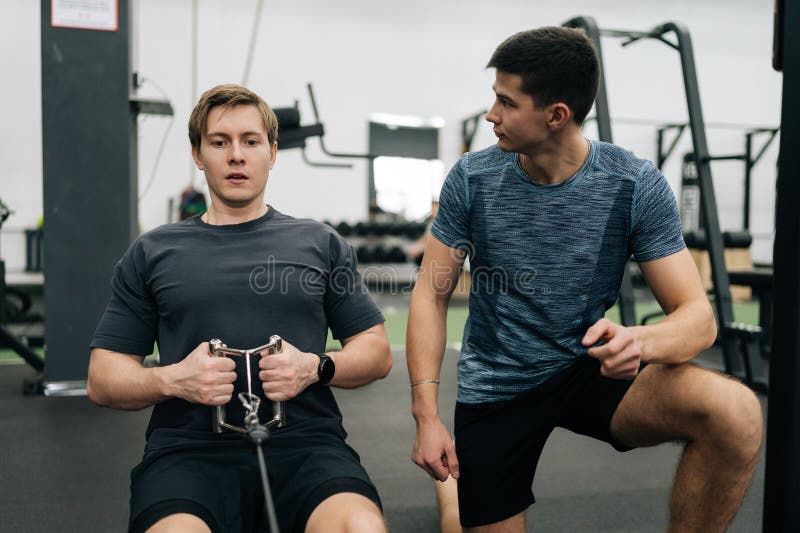 Handsome Beginner Sportsman Doing Side Lateral Raise with Dumbbells ...