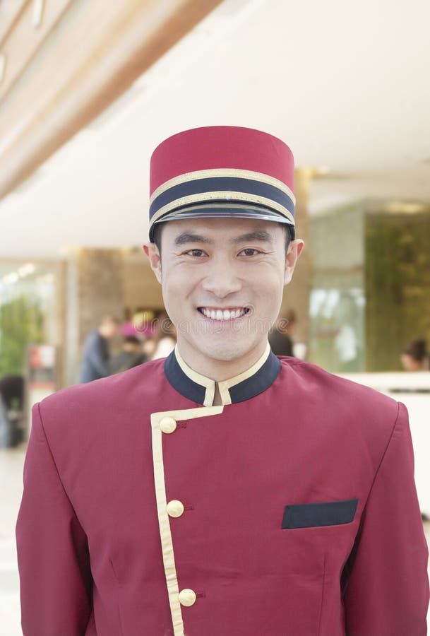 Portrait of Bellhop, Greeting, Studio Shot Stock Photo - Image of adult ...