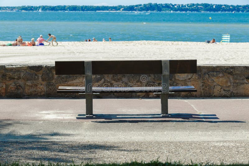 Portrait bench by sea stock image. Image of water, wooden - 264987901