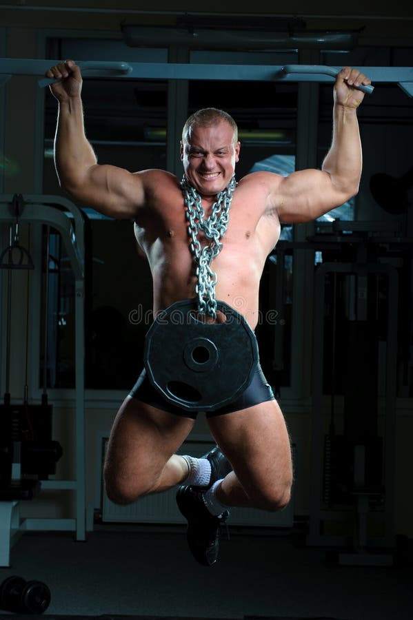 Muscular man in chains stock photo. Image of chains, captive - 11465462