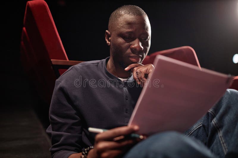 Portrait of Black Man Reading Script in Theater and Rehearsing for ...