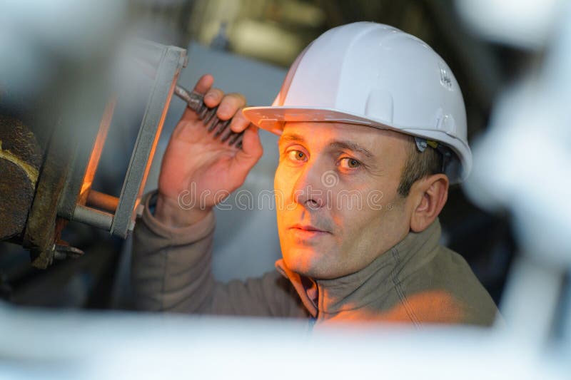 Portrait Blacksmith Checking Forge Stock Photo - Image of light ...