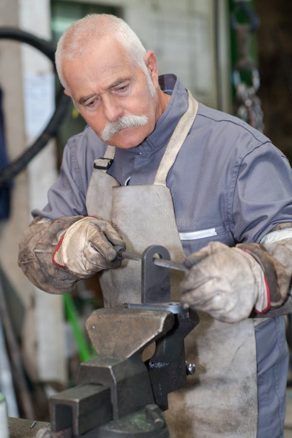 Portrait Blacksmiths daily Work Stock Image - Image of punch, shredding ...
