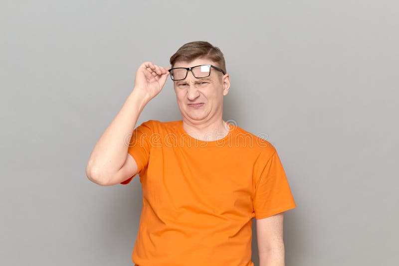 Portrait of Blond Mature Man Wincing and Grimacing from Disgust Stock ... Portrait of Blond Mature Man Wincing and Grimacing from Disgust Stock ...