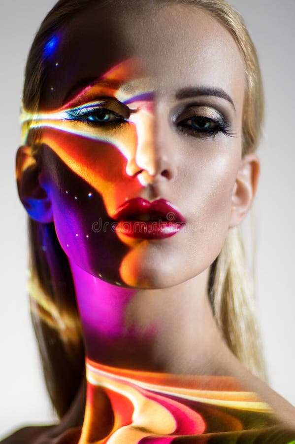 Portrait of Blond Woman with Shining Lights on Face Stock Image - Image ...