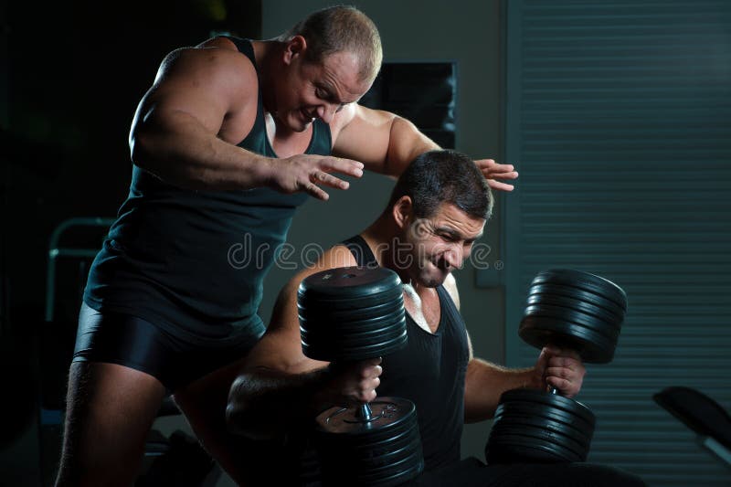 Portrait of bodybuilders stock photo. Image of determination - 17014100