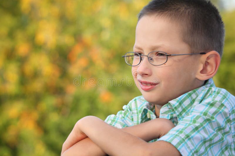 Portrait of Boy with Arms Across in Fall Park Stock Photo - Image of ...
