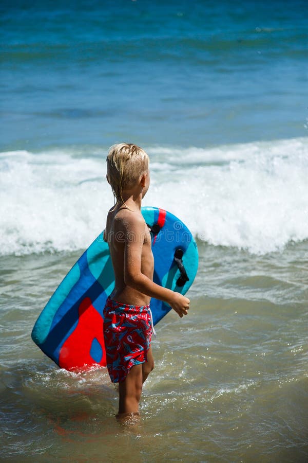 Boy with Bodyboard on the Background of the Sea Stock Image - Image of ...